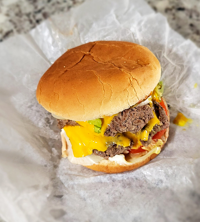 A classic cheeseburger done right&mdash;juicy patty, melted American cheese, fresh toppings. Sometimes the simplest things, executed perfectly, are what we remember most.