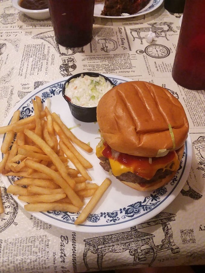 This isn't just a cheeseburger&mdash;it's architecture. A towering testament to the art of stacking deliciousness between two buns. Napkins required, no regrets allowed.