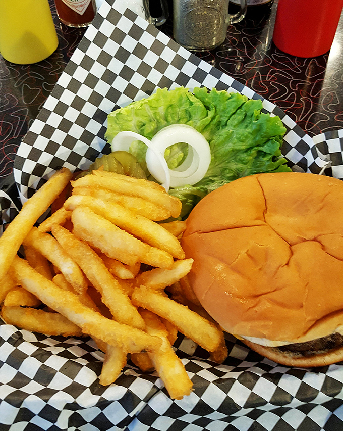 The classic American cheeseburger gets the respect it deserves here&mdash;served on a proper bun with crispy fries and zero pretension. Fast food chains, take notes.