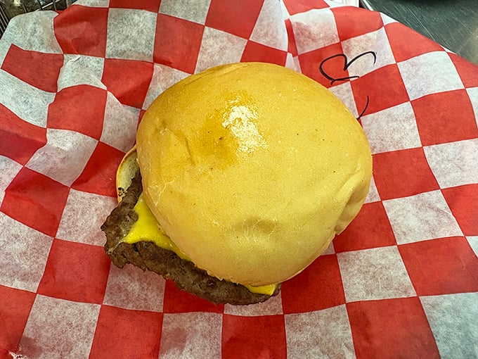 Simplicity perfected: a classic cheeseburger on a soft bun. No tweezers or microgreens required&mdash;just honest-to-goodness deliciousness.