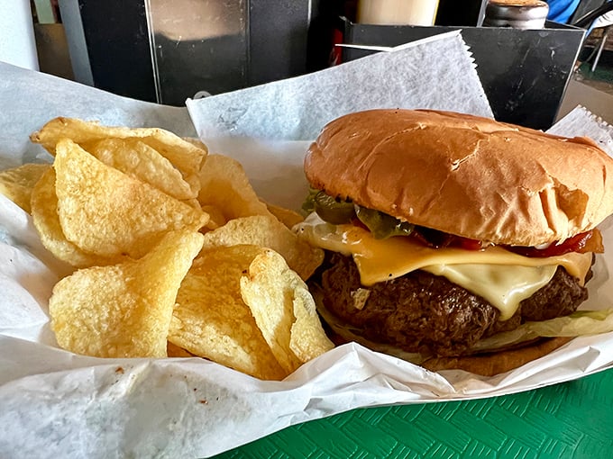 A proper burger should require both hands and at least three napkins. Tom's understands this fundamental truth of American cuisine.