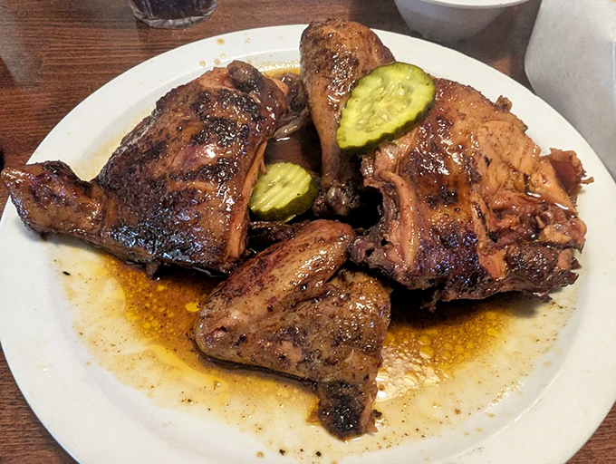 Chicken that's clearly been to BBQ finishing school. Those pickle accents add the perfect tangy counterpoint to smoky perfection.