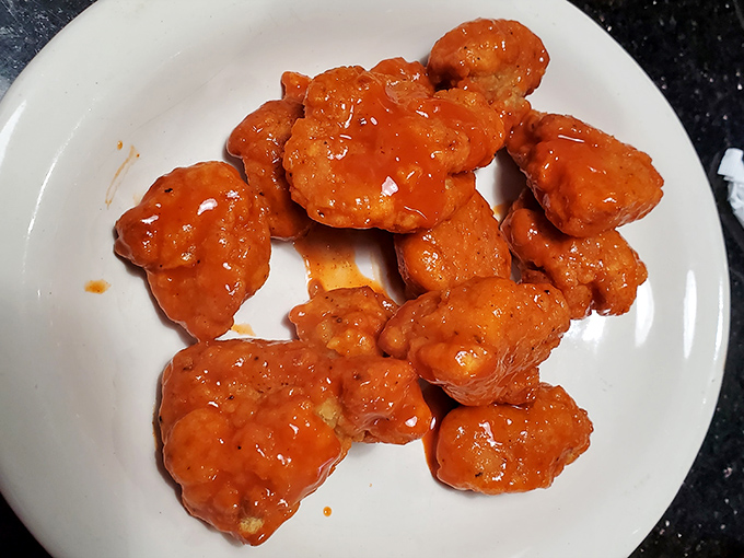 Buffalo chicken bites that bring just enough heat to make you reach for your beer, but not enough to make you regret your life choices.