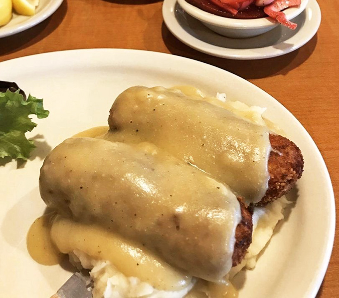 Chicken croquettes swimming in gravy &ndash; the kind of dish that makes you understand why your grandparents still talk about "good home cooking."