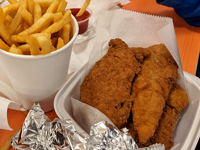 Golden-brown chicken fingers and fries&mdash;comfort food that speaks the universal language of "I regret nothing."