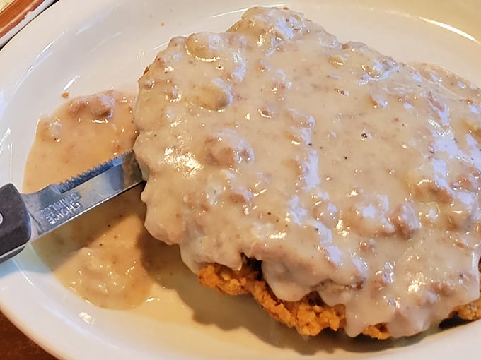Country fried steak swimming in peppery gravy&mdash;proof that sometimes the most beautiful things in life are completely smothered.