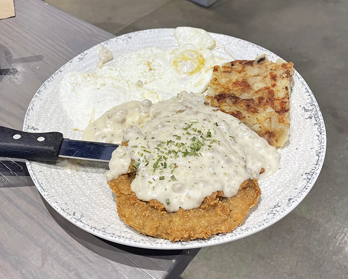 Country-fried comfort meets creamy gravy heaven &ndash; this plate proves that sometimes the best breakfast doesn't involve pancakes at all.