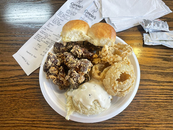 A plate that doesn't mess around&mdash;fried chicken livers, onion rings, and rolls that would make your grandmother nod in silent approval.