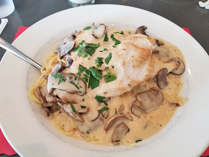 Chicken Marsala that would make an Italian grandmother nod in approval. Mushrooms bathing in wine sauce, pasta soaking up every drop of flavor.