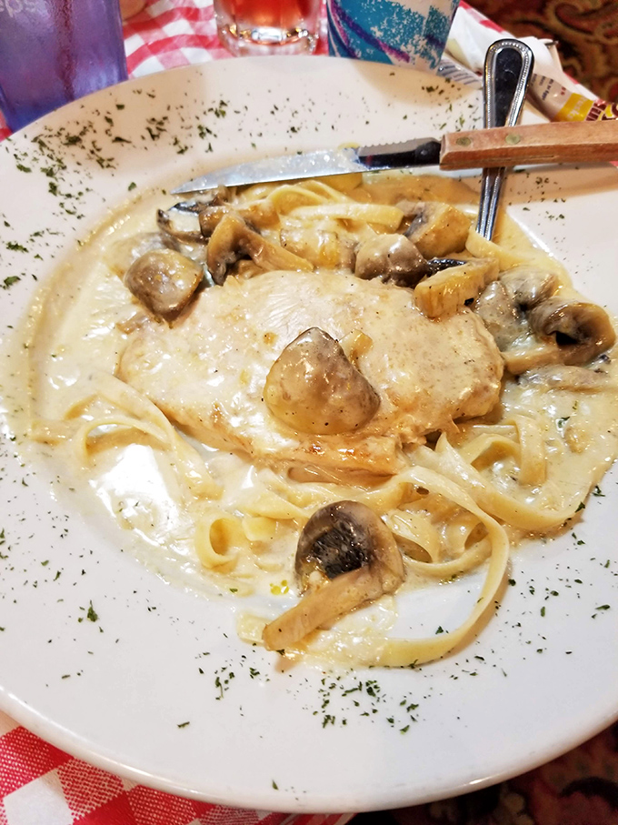 Fettuccine that doesn't know it's in Michigan, not Milan. Creamy, mushroom-studded comfort that makes winter nights bearable.