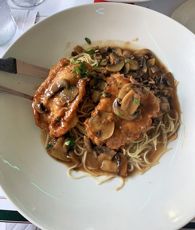 The star of the show: Chicken Marsala with mushrooms so perfectly saut&eacute;ed they deserve their own fan club. 
