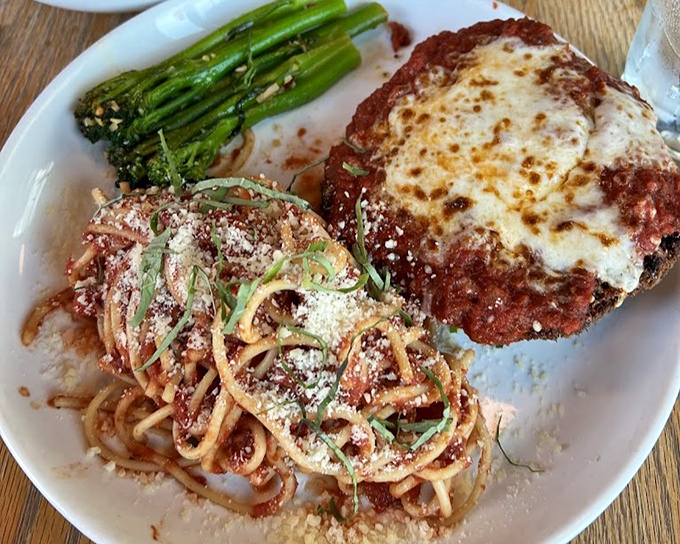 Pasta, chicken, and melted cheese&mdash;the holy trinity of comfort food gets the Basque treatment with bright tomato sauce and perfectly charred asparagus.