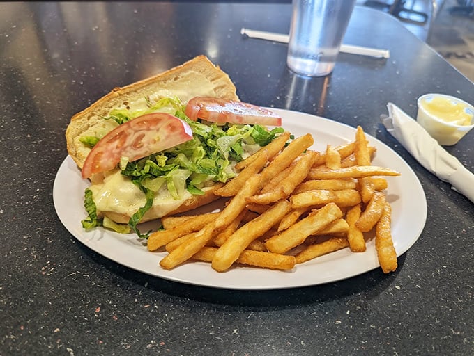 A sandwich that requires both hands and your full attention&mdash;melted cheese embracing every bite of this chicken Philly masterpiece.