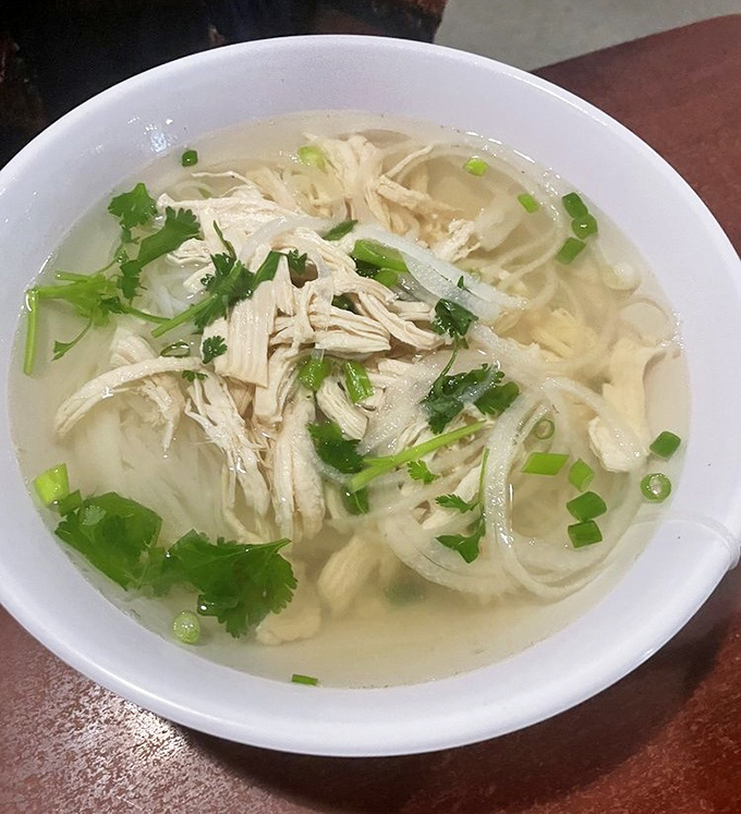 Chicken pho: the lighter cousin to beef that's no less impressive, with tender poultry and fresh herbs creating a bowl that's both comforting and revitalizing.