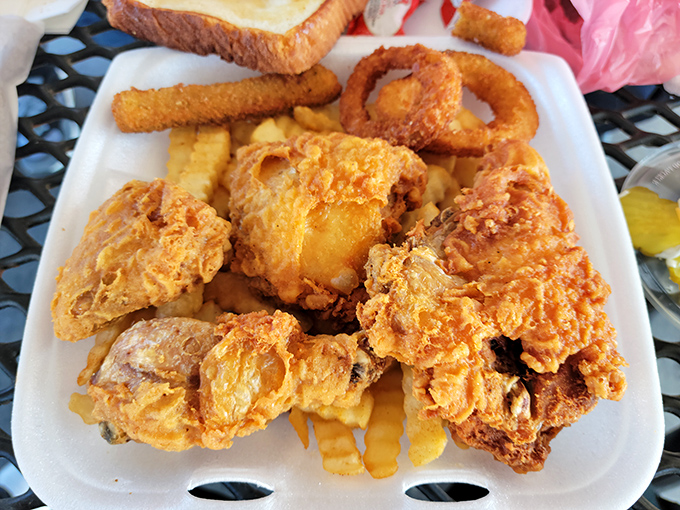 Fried chicken that would make your grandmother jealous, served with the kind of fries that demand to be stolen from your dining companion's plate.
