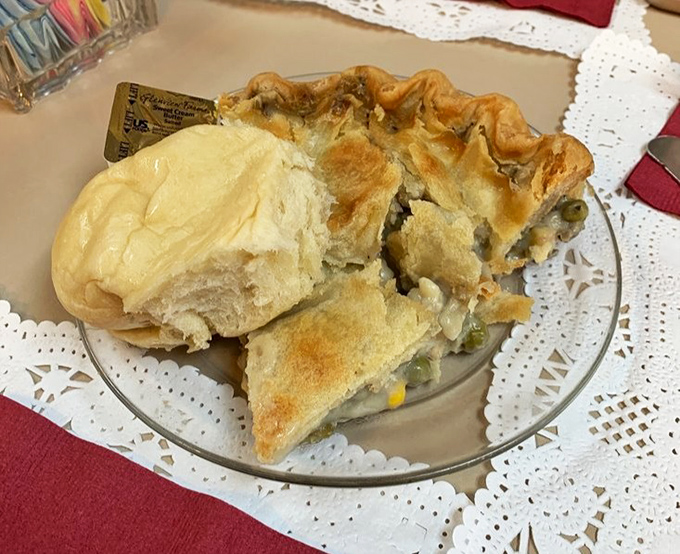 This chicken pot pie isn't just comfort food&mdash;it's a warm hug on a plate. That golden dome of pastry promises savory treasures beneath.