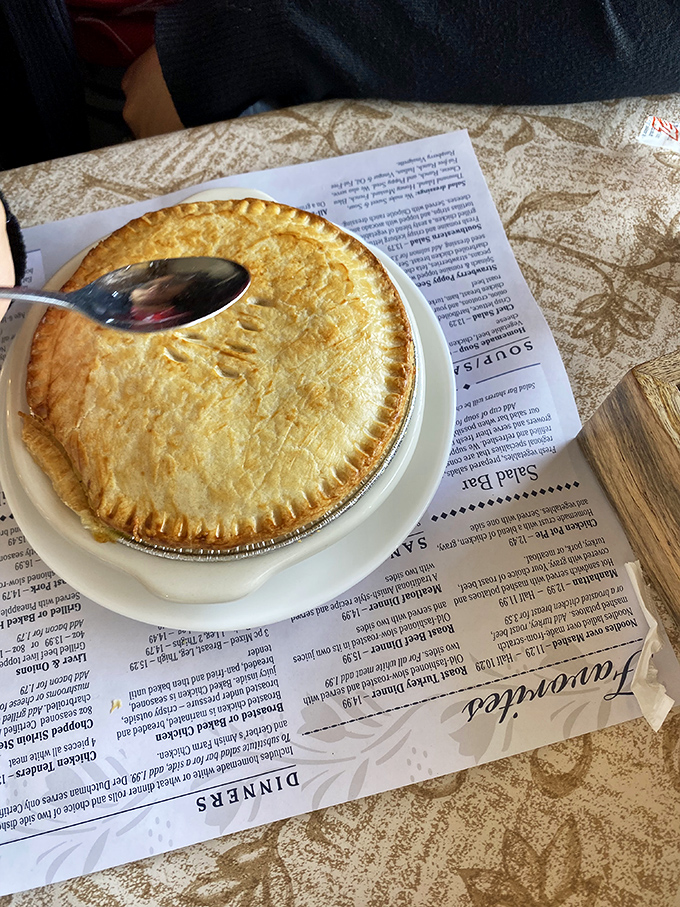 Chicken pot pie that doesn't hide in a crust, but proudly displays its golden-topped glory like the comfort food champion it is.