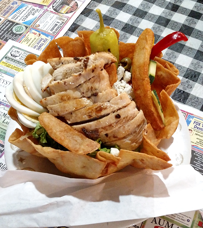A chicken salad that doesn't mess around&mdash;crisp greens, perfectly grilled meat, and a tortilla bowl that says "yes, you can eat your dishes."