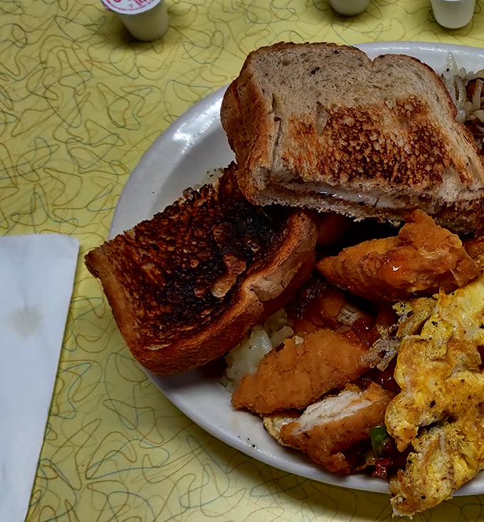 Toast that's achieved that perfect golden-brown hue, home fries with just the right crisp, and eggs that would make a chicken proud.