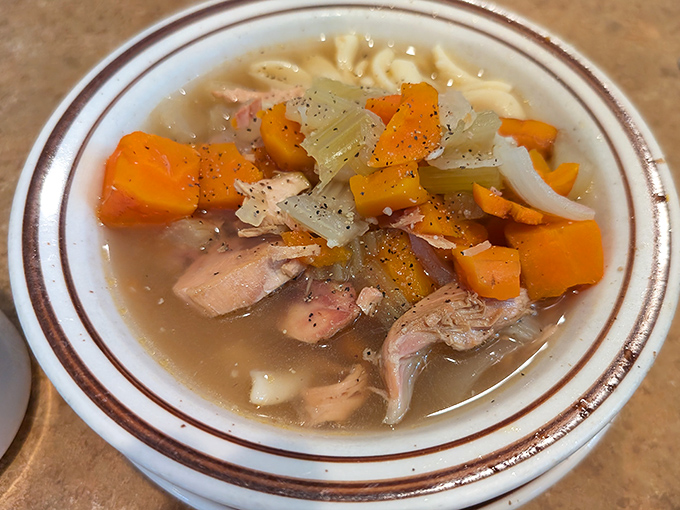 Chicken soup that grandmother would approve of&mdash;chunks of meat, vegetables, and noodles swimming in liquid comfort. Cold remedies come and go; this is eternal.