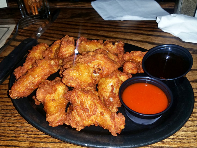 Golden-fried chicken tenders with dipping sauces that make you wonder if the chicken is just a vehicle for that heavenly buffalo sauce.