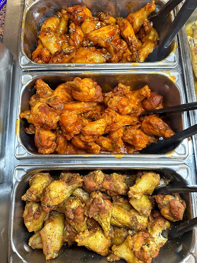 Three different styles of chicken wings in one buffet? It's like the poultry Olympics, and everyone gets a gold medal for flavor.