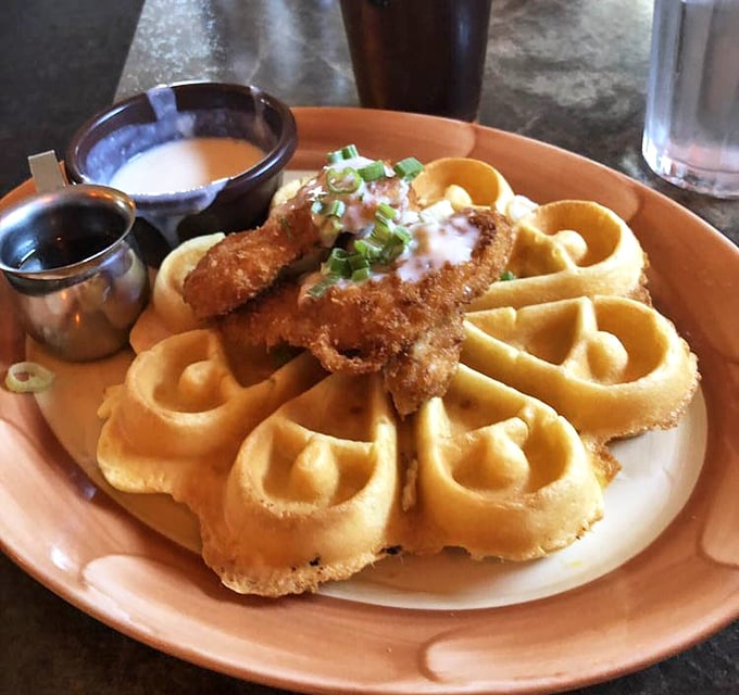 Southern fried chicken meets Belgian waffle in a breakfast marriage made in heaven, with hazelnut syrup playing matchmaker to these perfect partners.