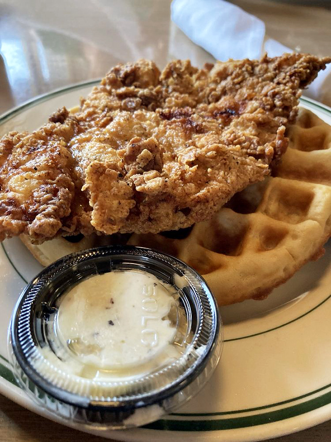 Chicken and waffles: the breakfast equivalent of a power couple. That golden-brown chicken could make Colonel Sanders weep with joy.