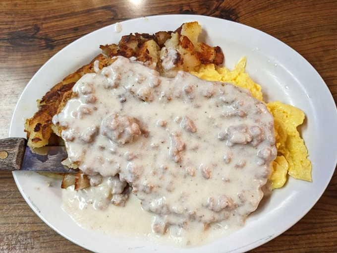 Biscuits and gravy: the breakfast that hugs you from the inside. This plate has "nap afterward" written all over it.