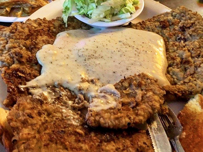 The chicken fried steak that launched a thousand road trips&mdash;a crispy, golden masterpiece that barely fits on the plate.