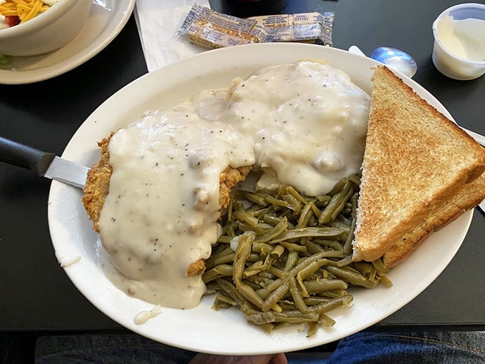 When country gravy blankets chicken fried steak like this, with green beans standing by for moral support, you know you're in good hands.