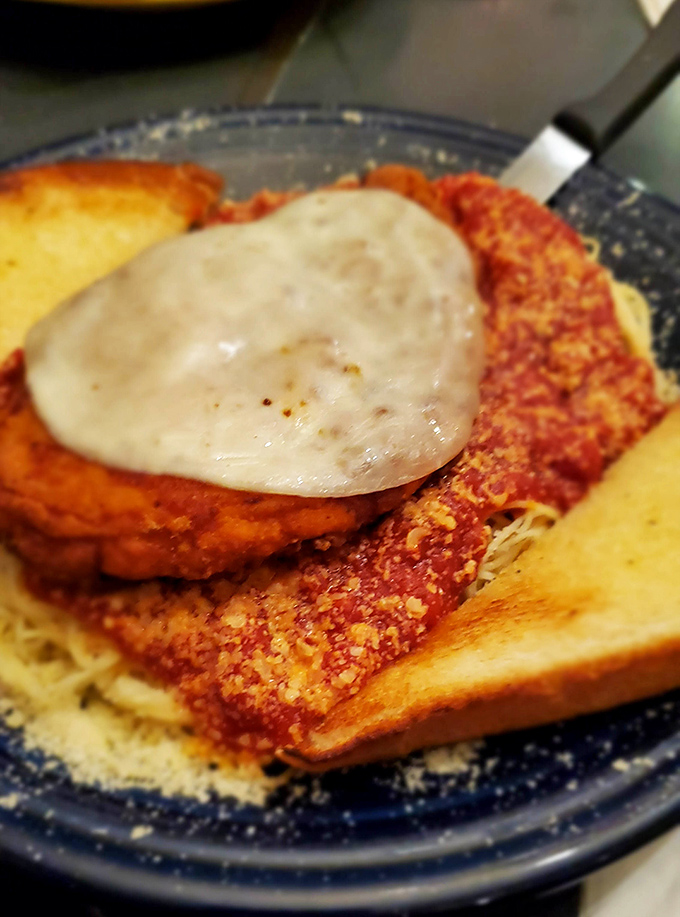 Chicken Parmesan that doesn't just sit on the plate&mdash;it lounges there with Italian-American confidence.