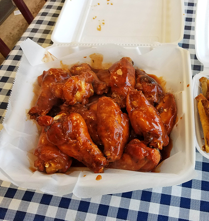 These wings aren't just coated in sauce&mdash;they're baptized in it. The kind of messy perfection that justifies the extra napkins.
