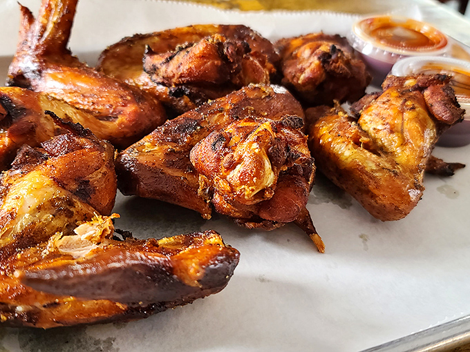 Smoked wings with skin crackling like nature's candy&mdash;proof that chickens didn't evolve just to cross roads, but to be smoked to perfection at Woodyard.