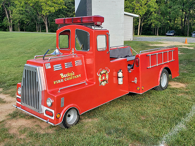 Becky's vintage fire truck stands ready for imaginary emergencies and very real photo opportunities for visitors young and old.