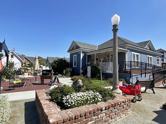 The Children's Storybook Garden creates the perfect backdrop for making memories with grandkids, where a red wagon becomes a chariot of imagination.