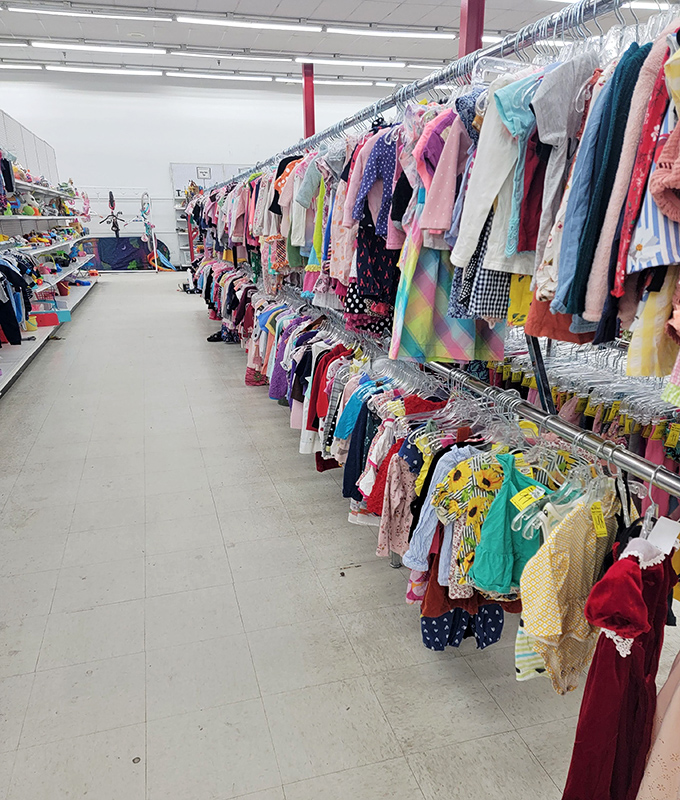 Tiny outfits tell tales of birthday parties, first days of school, and childhood memories preserved. 