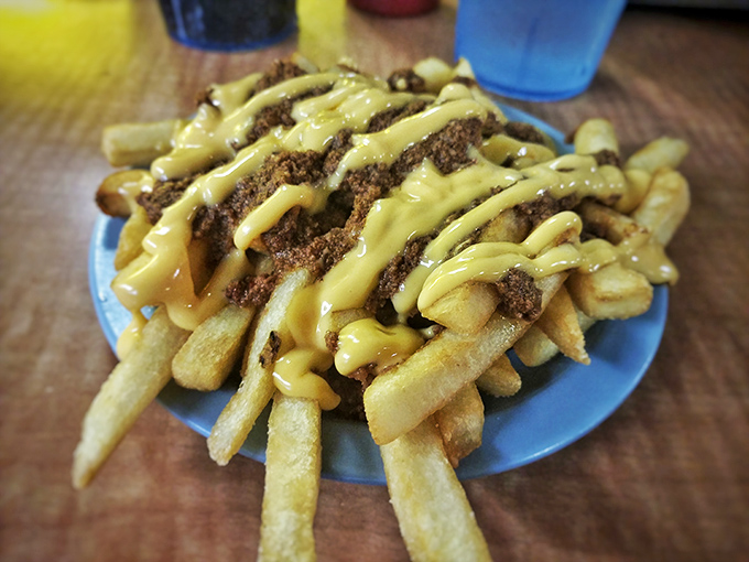 Chili cheese fries: where the fork becomes optional and napkins become mandatory. Worth every messy, glorious bite.