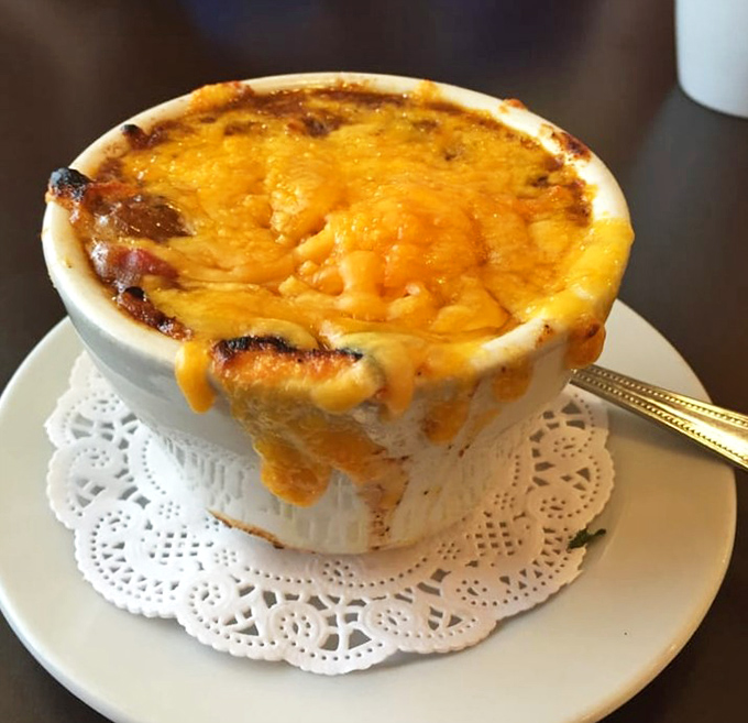 The French onion soup arrives like a volcanic cheese eruption&mdash;a bubbling cauldron of comfort that demands to be cracked with a spoon.