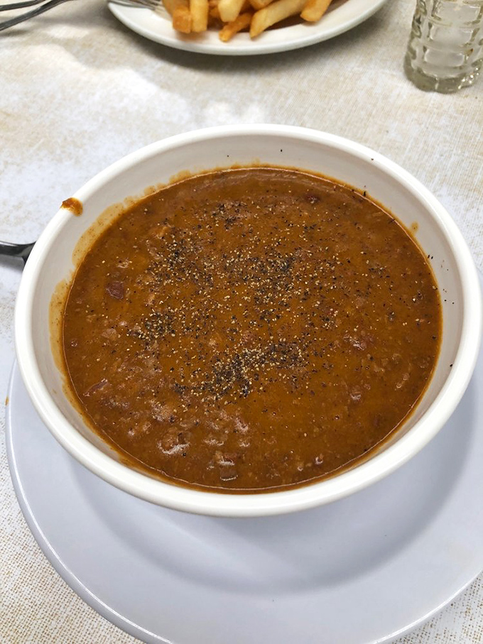 Their chili deserves its own zip code &ndash; rich, mysterious, and absolutely worth the napkin casualties.