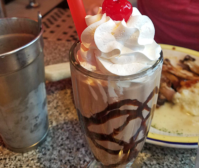 This chocolate malt isn't just a dessert&mdash;it's a commitment. Thick enough to bend your straw, with whipped cream that reaches heights requiring FAA clearance.