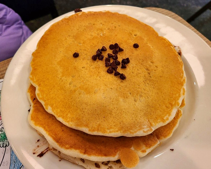 These pancakes don't just have chocolate chips&mdash;they've entered a committed relationship with them and neither is looking back.
