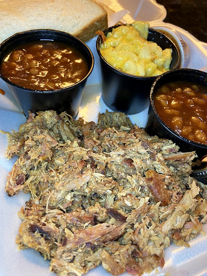 Chopped pork with all the fixings - this isn't just a meal, it's a Southern handshake that says "welcome to the good life."