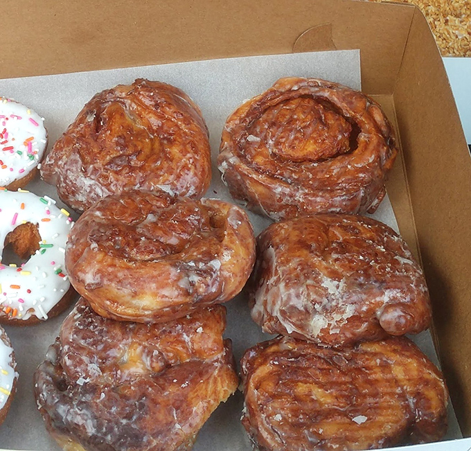 The cinnamon roll box &ndash; where spiral-shaped happiness comes glazed and ready to transform any ordinary morning into a celebration.