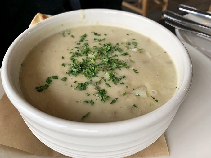 Clam chowder so authentic it should come with its own lighthouse. Creamy without being heavy, each spoonful a warm embrace from the Atlantic.