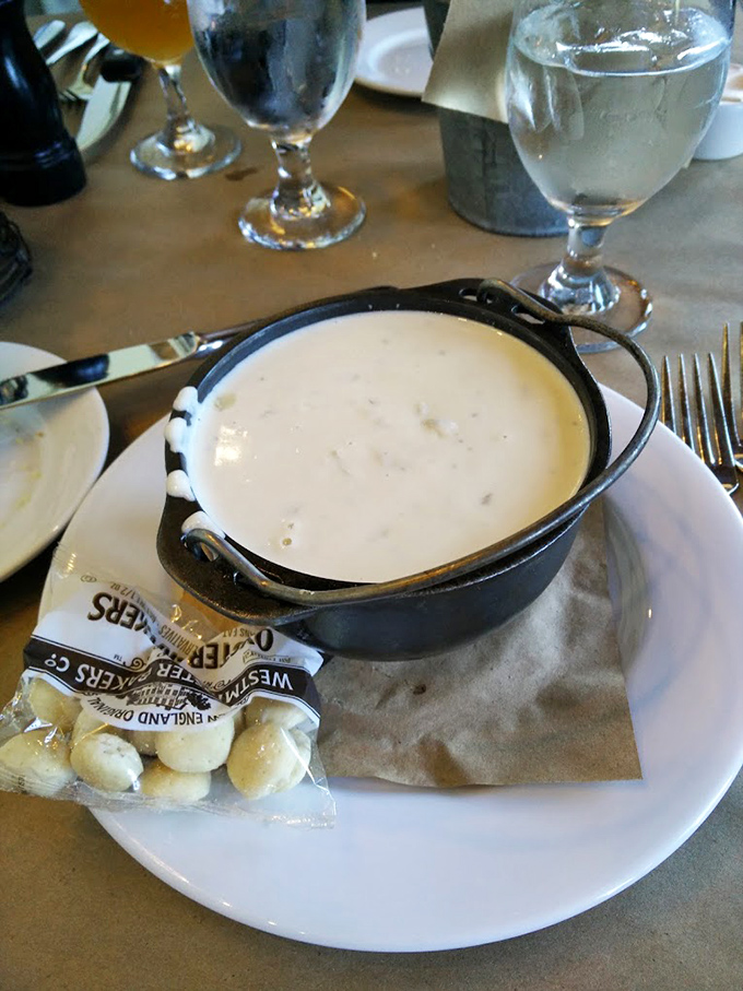 New England clam chowder served in cast iron with oyster crackers&mdash;seafood comfort in a bowl that would make your Massachusetts ancestors proud.
