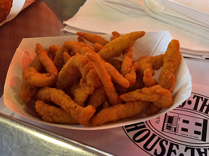 Clam strips that crunch like your favorite childhood memories. These golden morsels are what seafood dreams are made of.