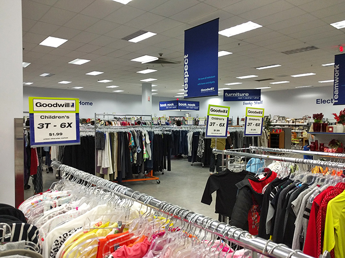 The clothing department stretches toward the horizon like a textile ocean, with color-coded islands of potential style upgrades waiting to be discovered.