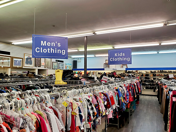 Clothing racks stretch toward the horizon, organized by size and type for maximum browsing efficiency.