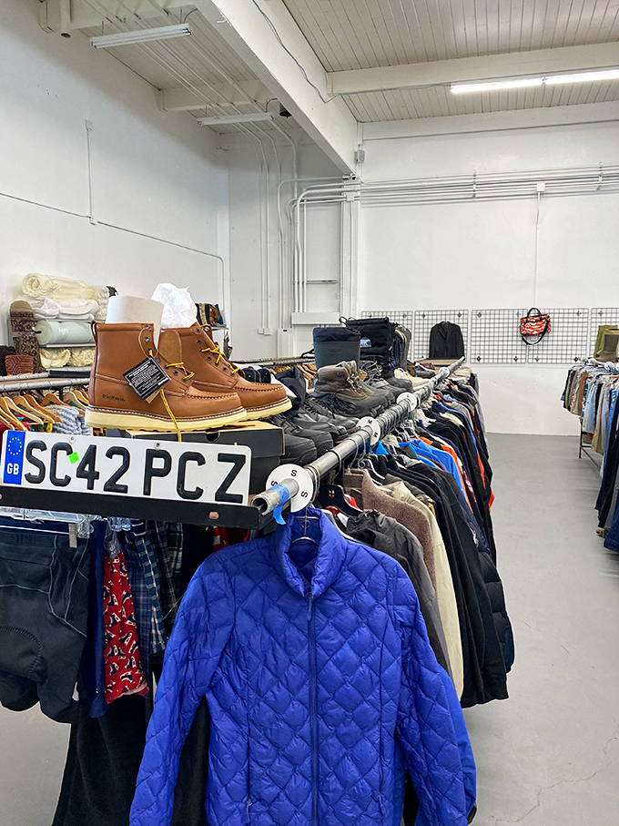 Clothing racks stretch toward the horizon like a textile sea, with that perfect blue quilted jacket calling your name.